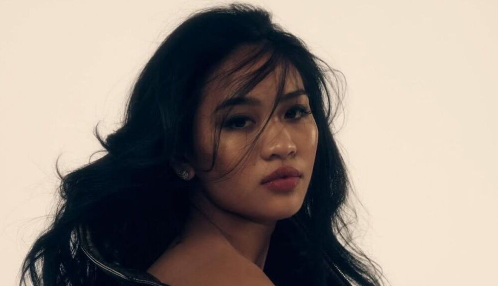 Suni Lee Wows Fans with Stunning Bikini Photos at Waterfall - 0563NEWS